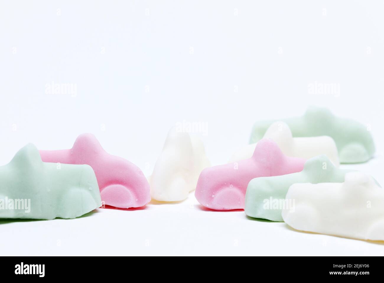 many candy cars in three different flavors on white background Stock ...