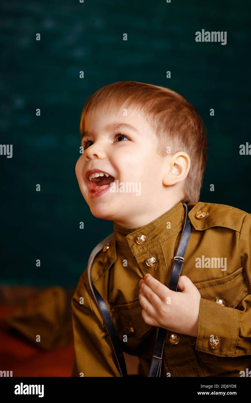 Excited little boy. Cheering cute blonde boy. Surprised attractive boy ...