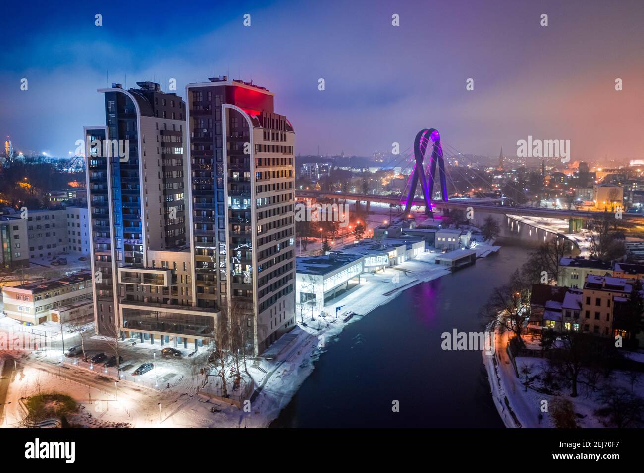 University Route in Bydgoszcz in winter by night. Bridge over Brda ...