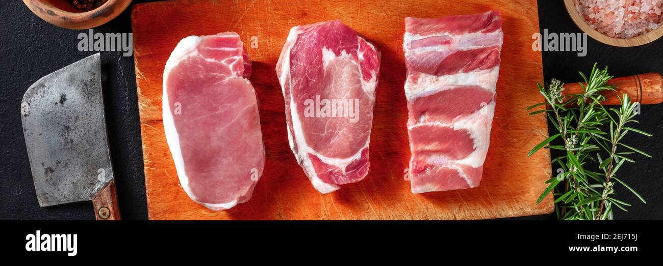 Pork panorama. Various types of pork meat cuts, shot from the top on a ...