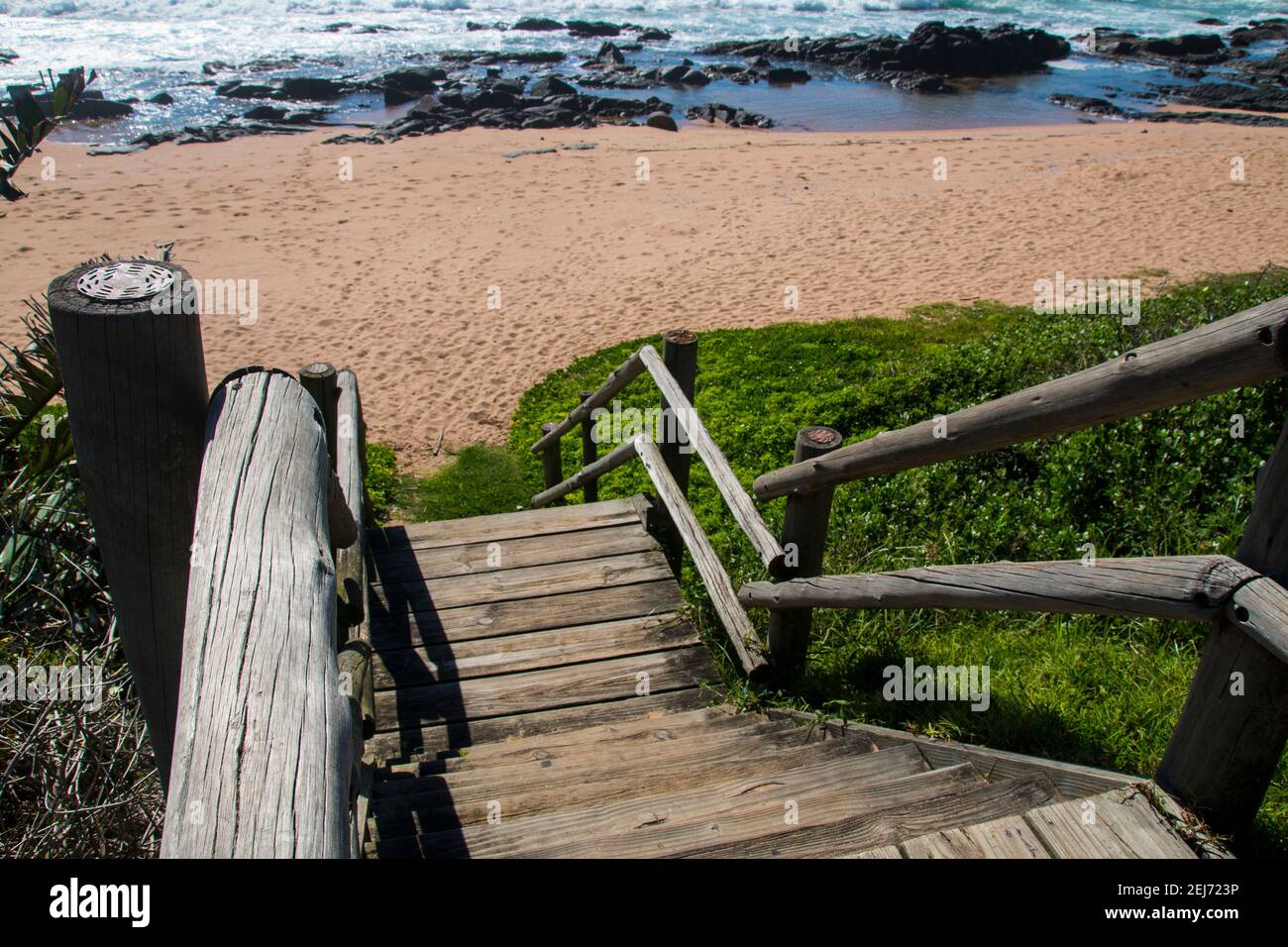 Wooden walkway onto beach hi-res stock photography and images - Alamy