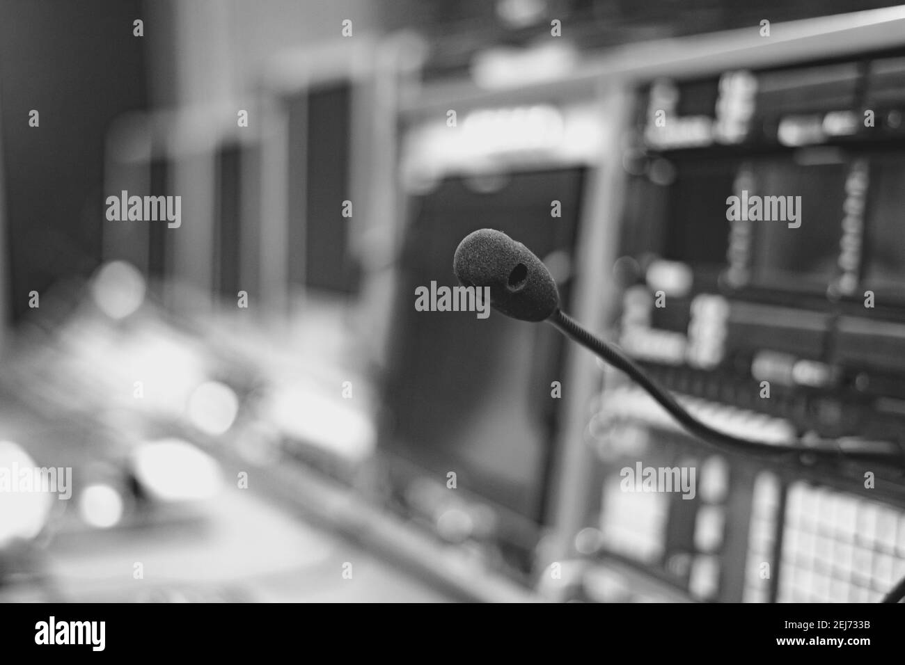microphone at a press conference close-up, background in out of focus ...