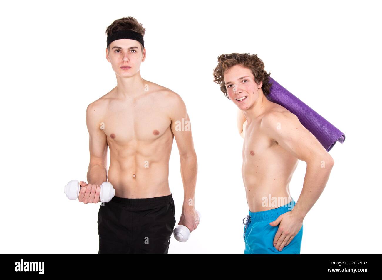 Fitness and healthy lifestyle. Two young attractive students in the gym ...