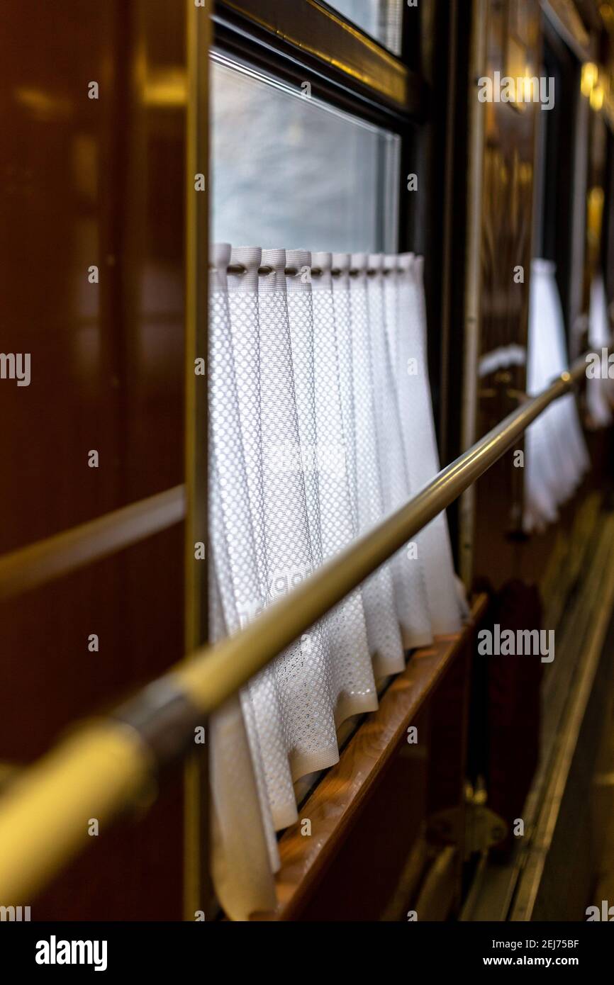 Lace curtains on the window in the train carriage Stock Photo - Alamy