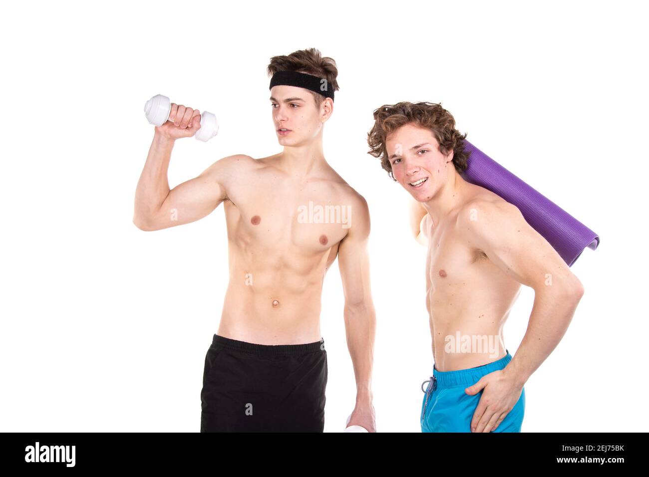 Fitness and healthy lifestyle. Two young attractive students in the gym ...