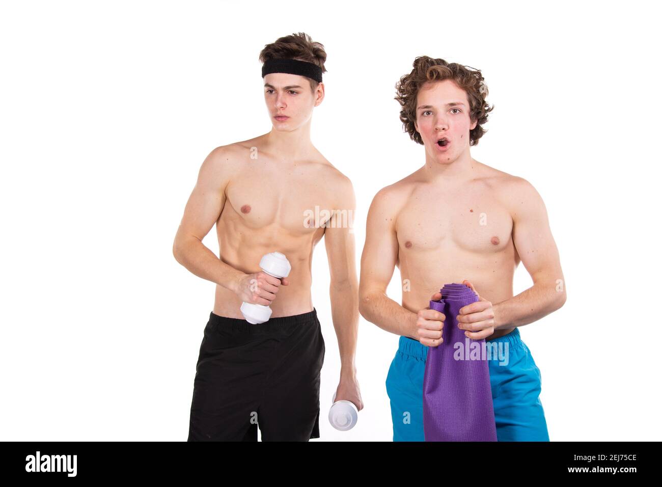 Fitness and healthy lifestyle. Two young attractive students in the gym ...
