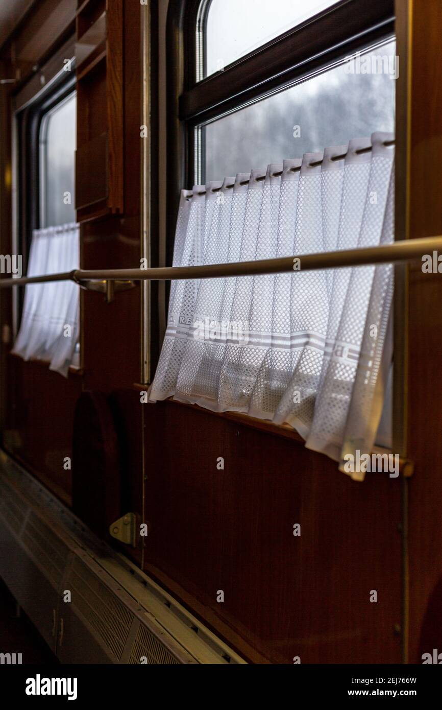 Lace curtains on the window in the train carriage Stock Photo - Alamy