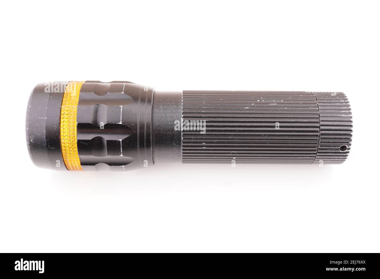 black metal flashlight on a white background Stock Photo - Alamy