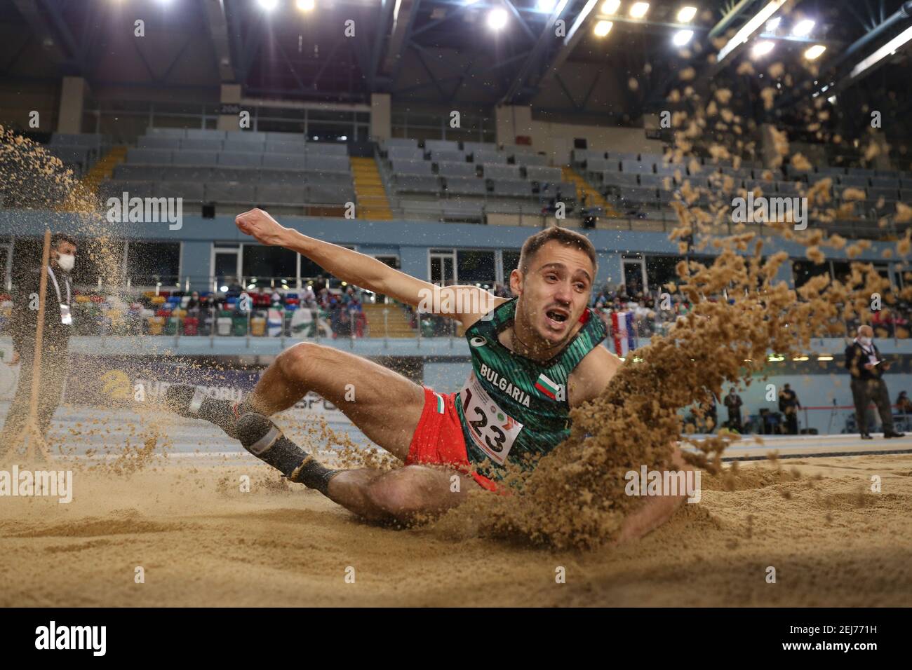 ISTANBUL, TURKEY - FEBRUARY 20, 2021: Undefined athlete long jumping ...