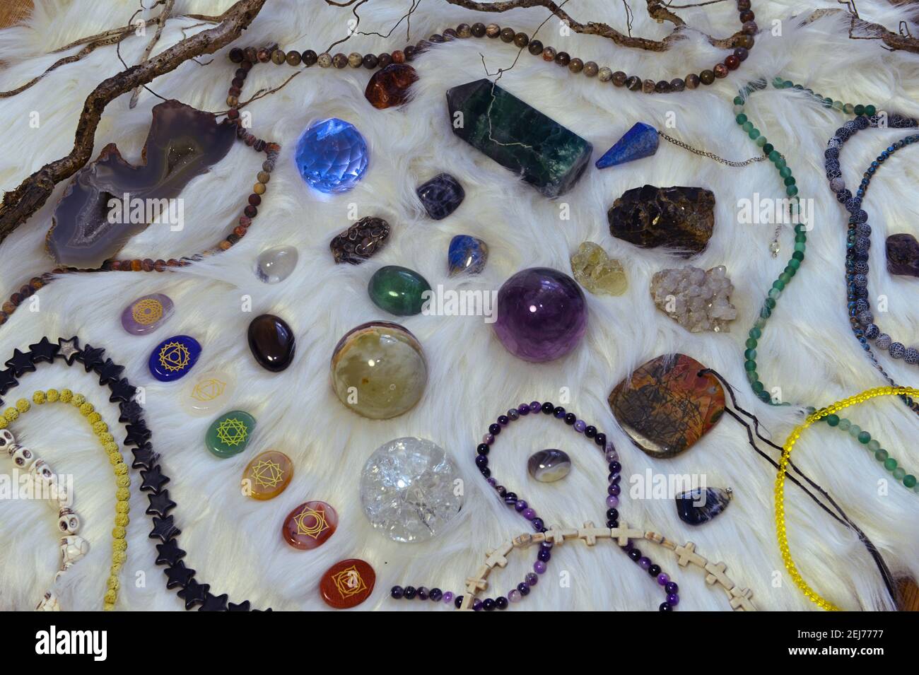 Collection of crystal stones and minerals with magic ritual objects ...