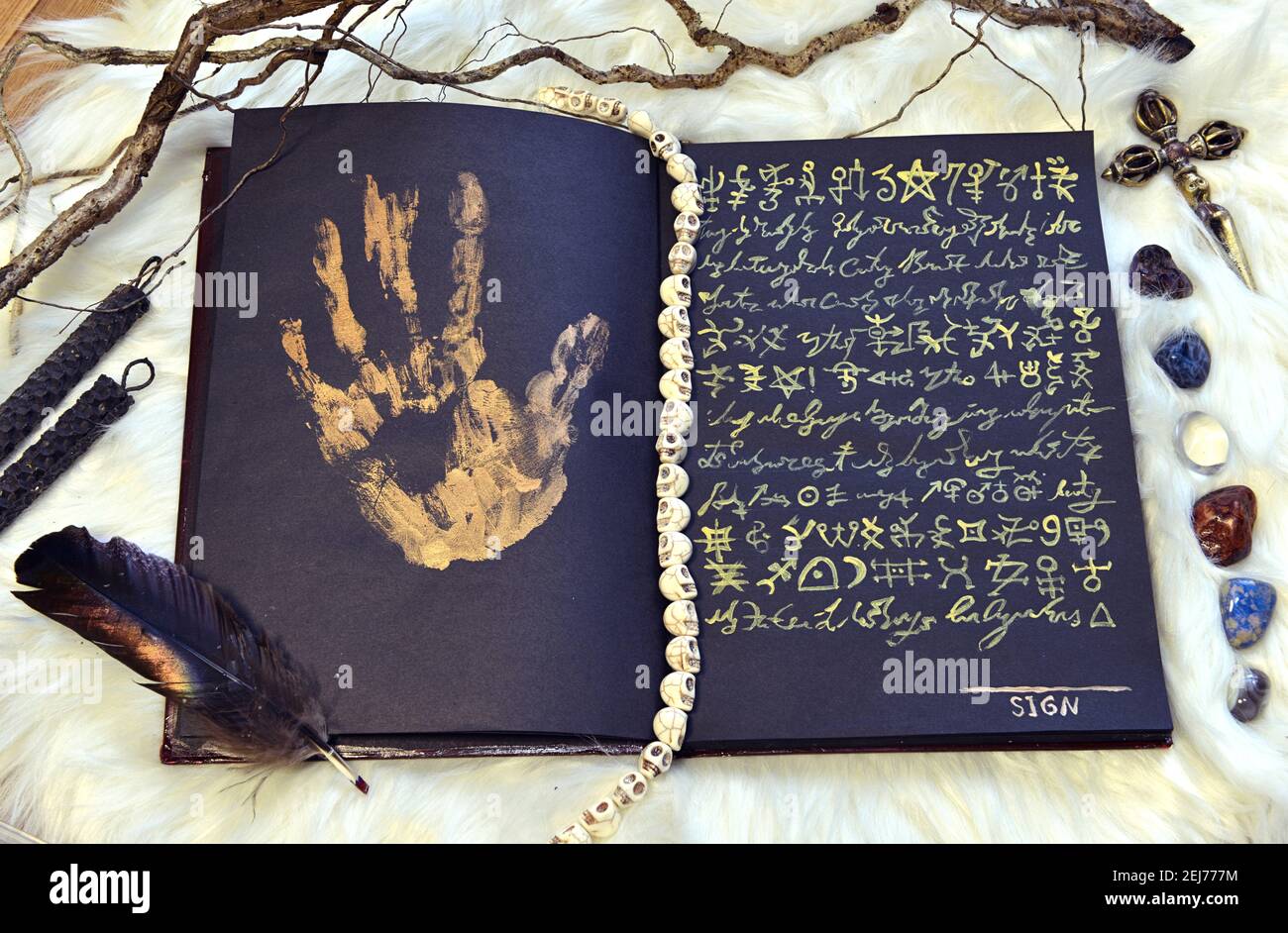 Sell soul to devil concept, black magic book with palmprint and quill ...