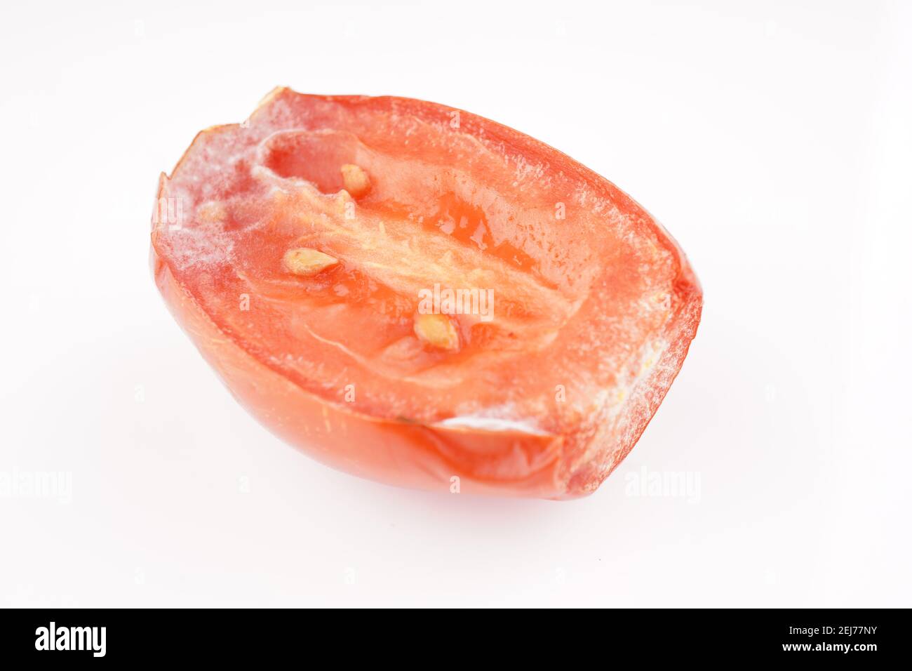 rotten tomato on white background Stock Photo - Alamy