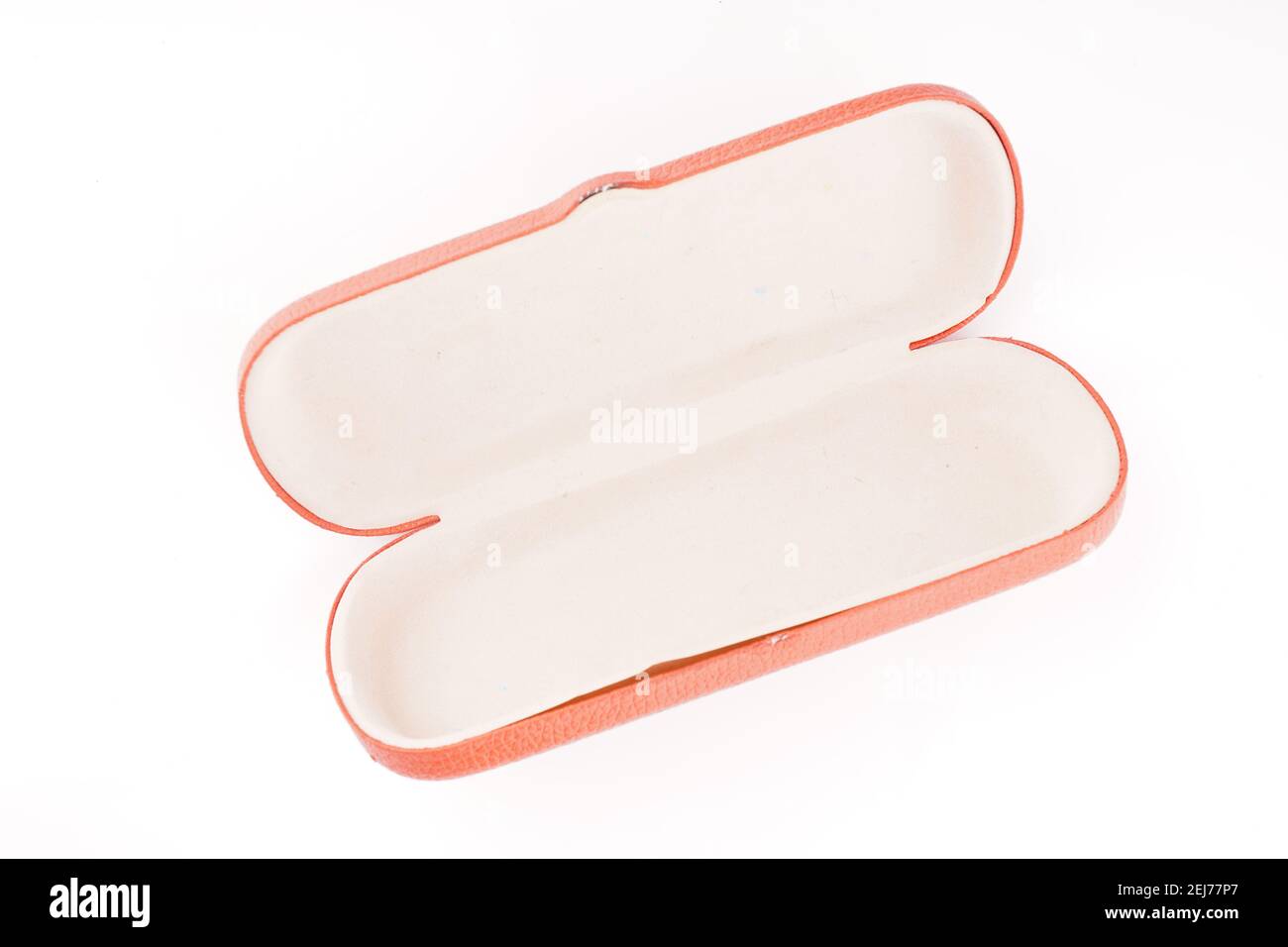 red glasses case on white background Stock Photo - Alamy