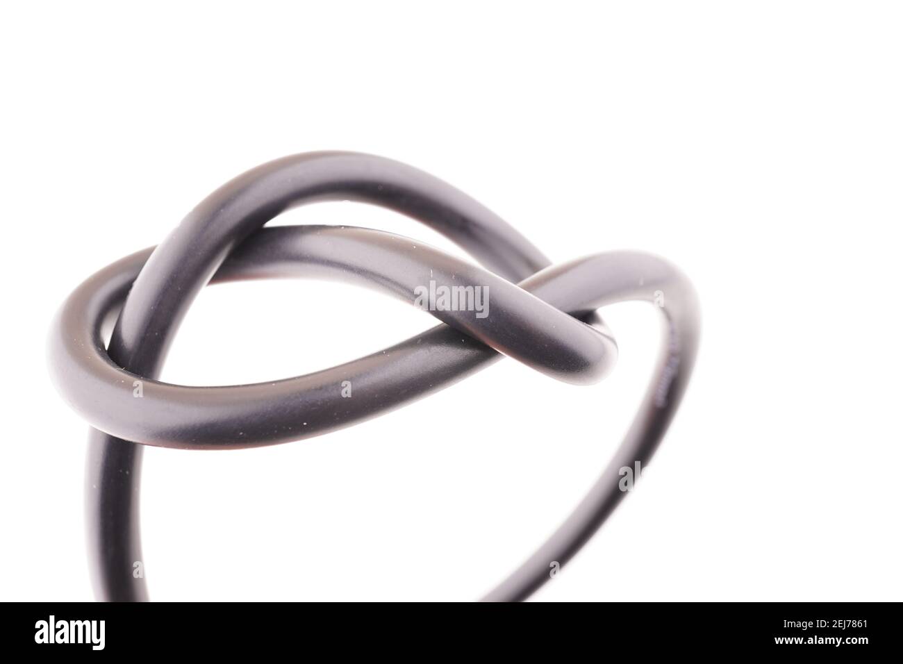 black electrical wire on white background Stock Photo - Alamy