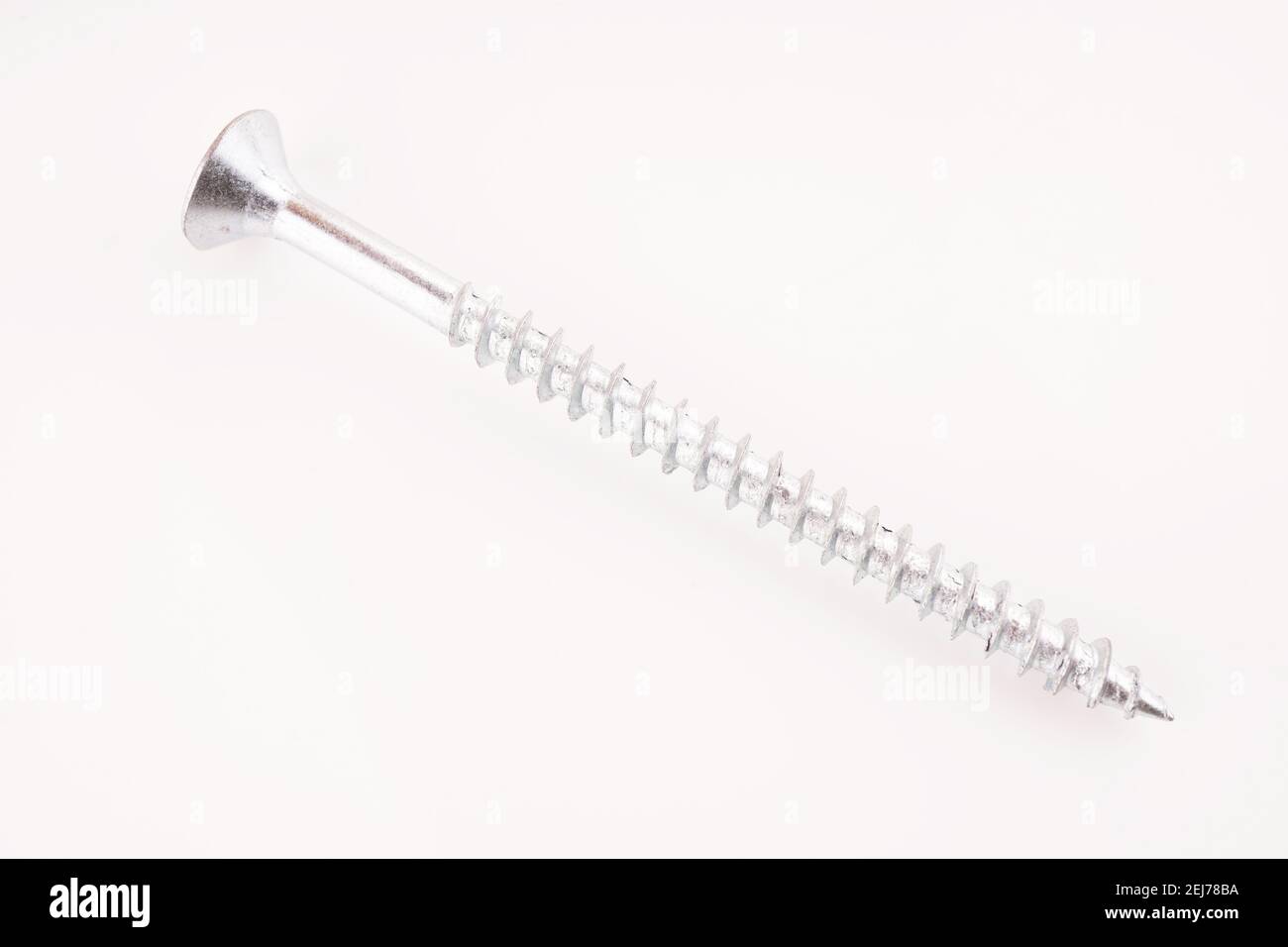 self-tapping screw on a white background Stock Photo - Alamy