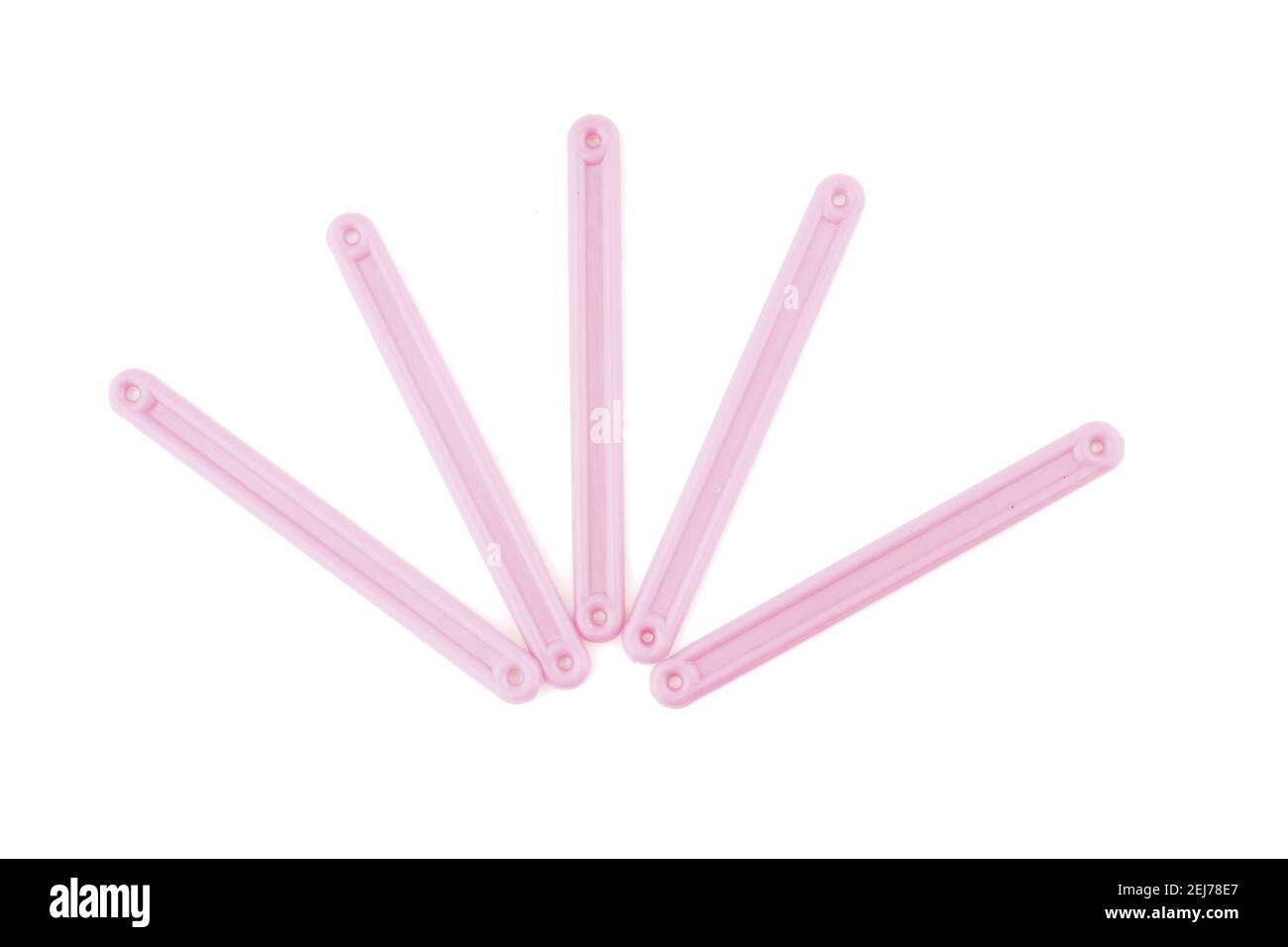 pink counting sticks on a white background Stock Photo - Alamy
