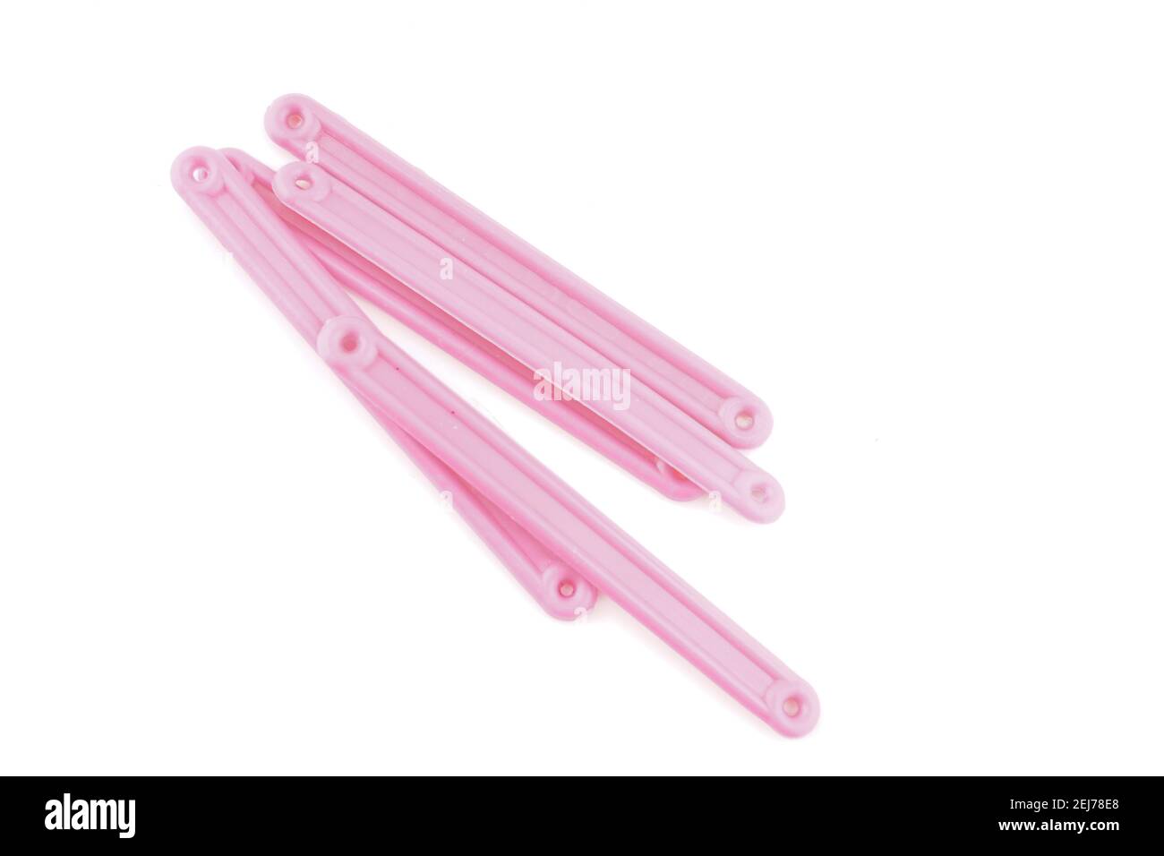 pink counting sticks on a white background Stock Photo - Alamy