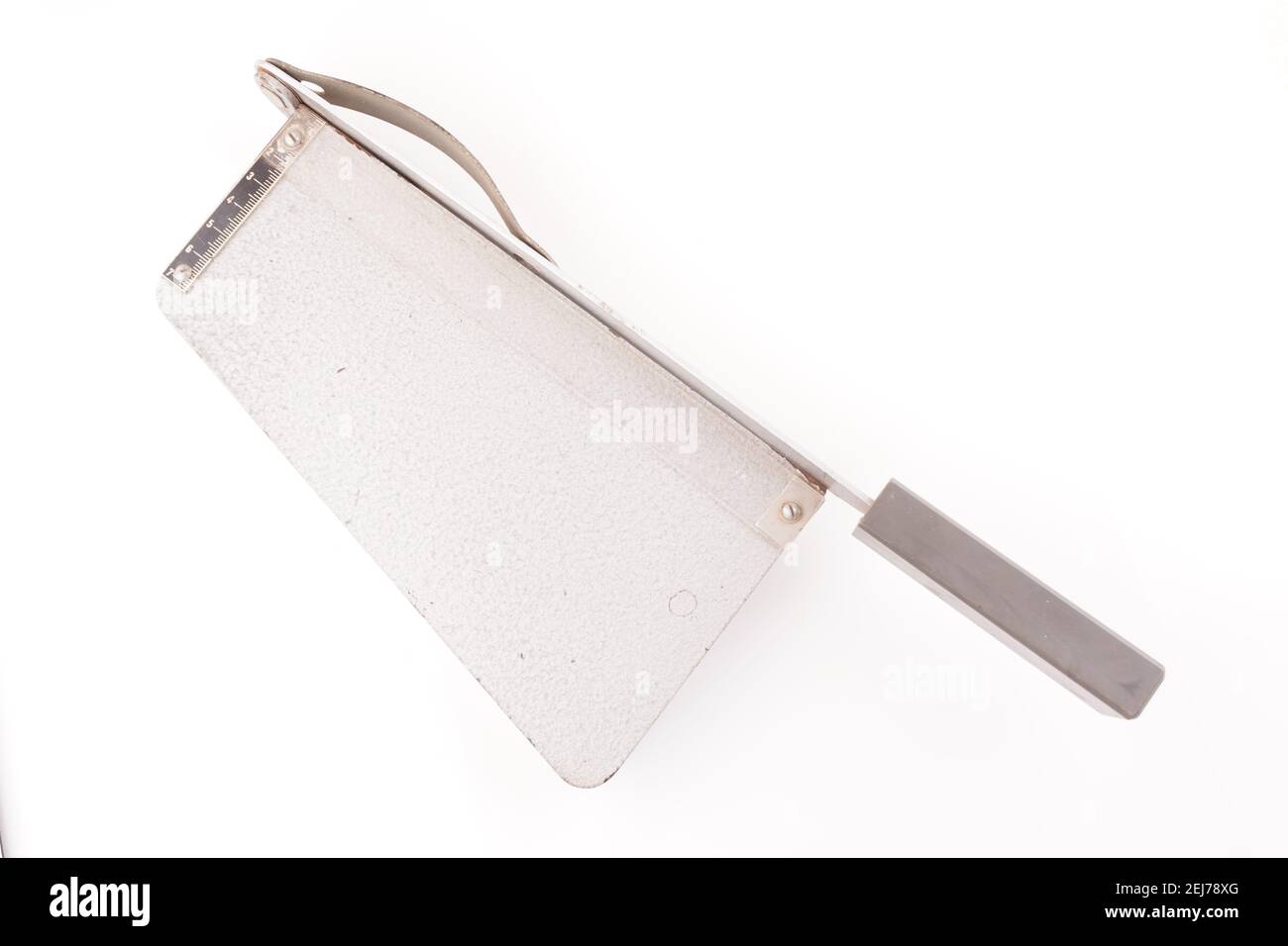 paper cutter on white background Stock Photo - Alamy
