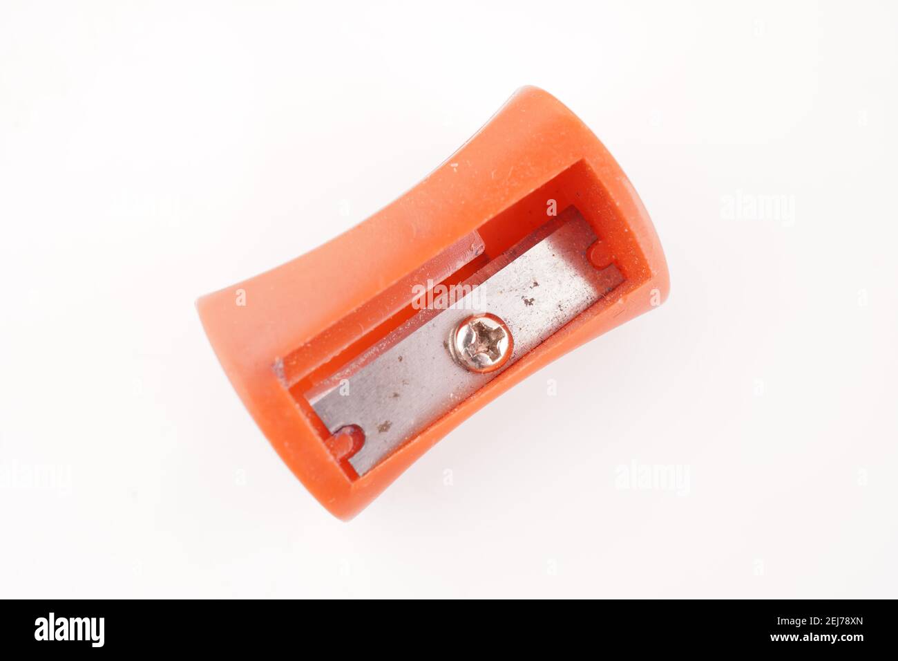red pencil sharpener on white background Stock Photo - Alamy