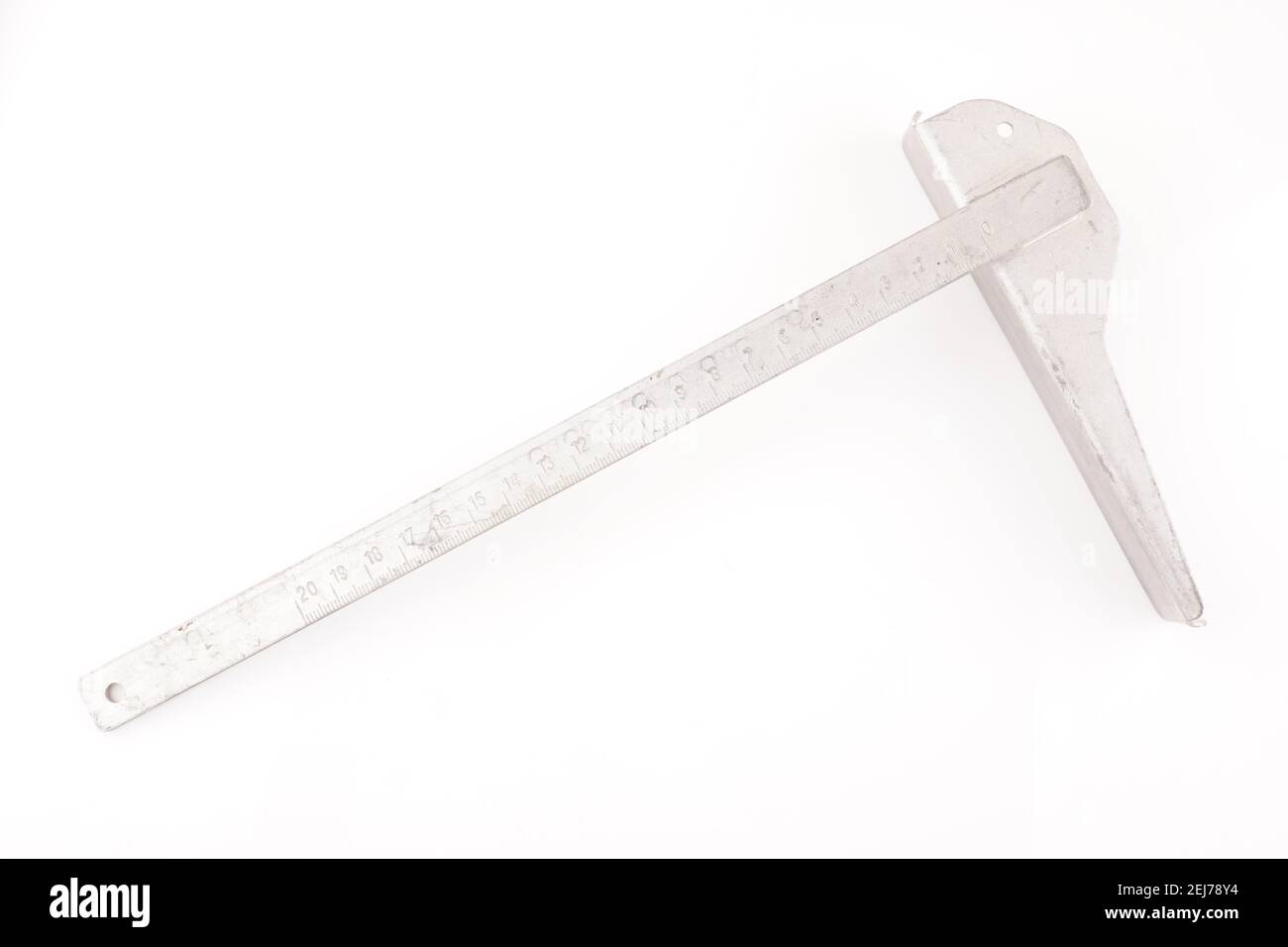 metal ruler on white background Stock Photo - Alamy