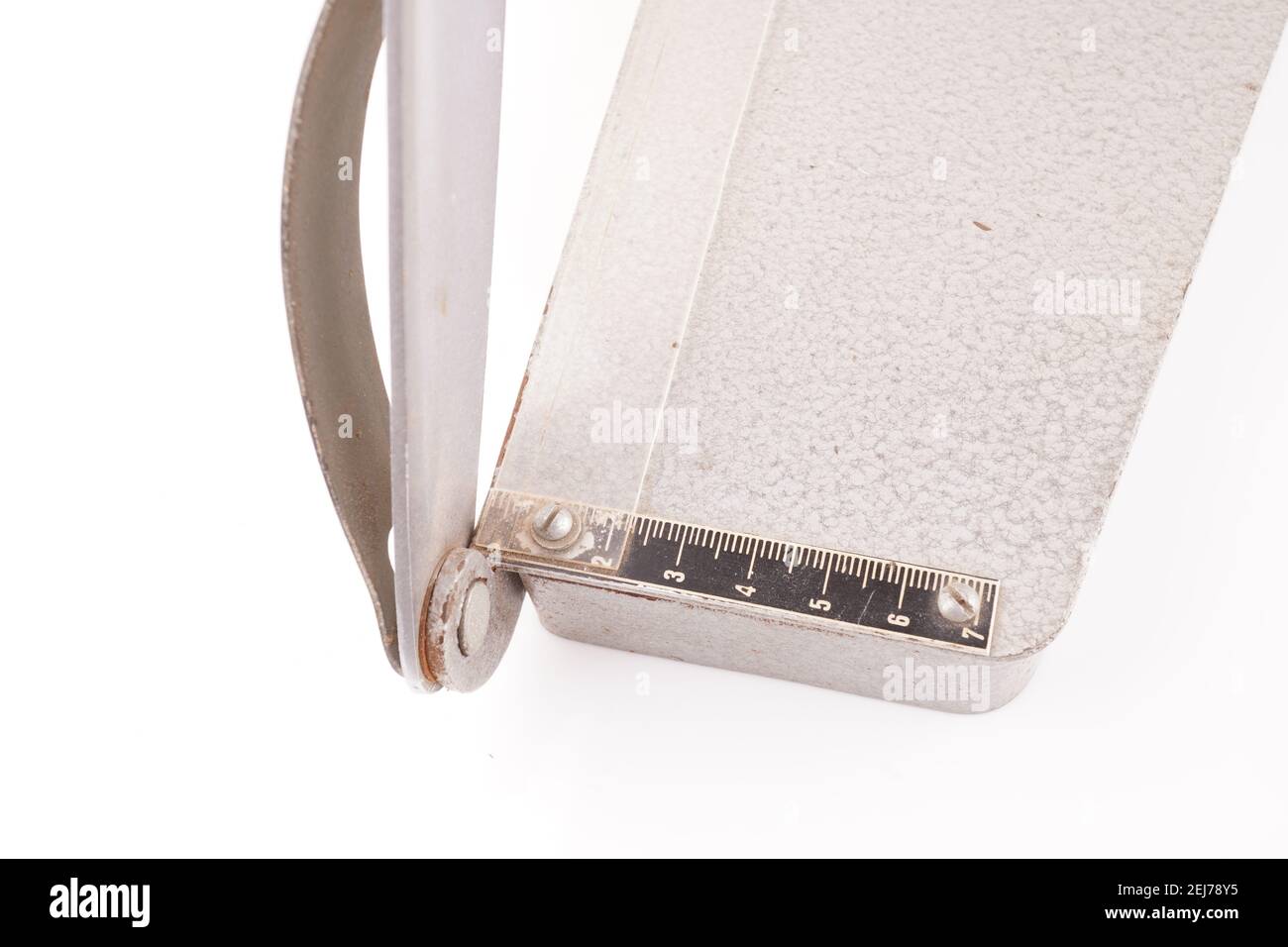 paper cutter on white background Stock Photo - Alamy