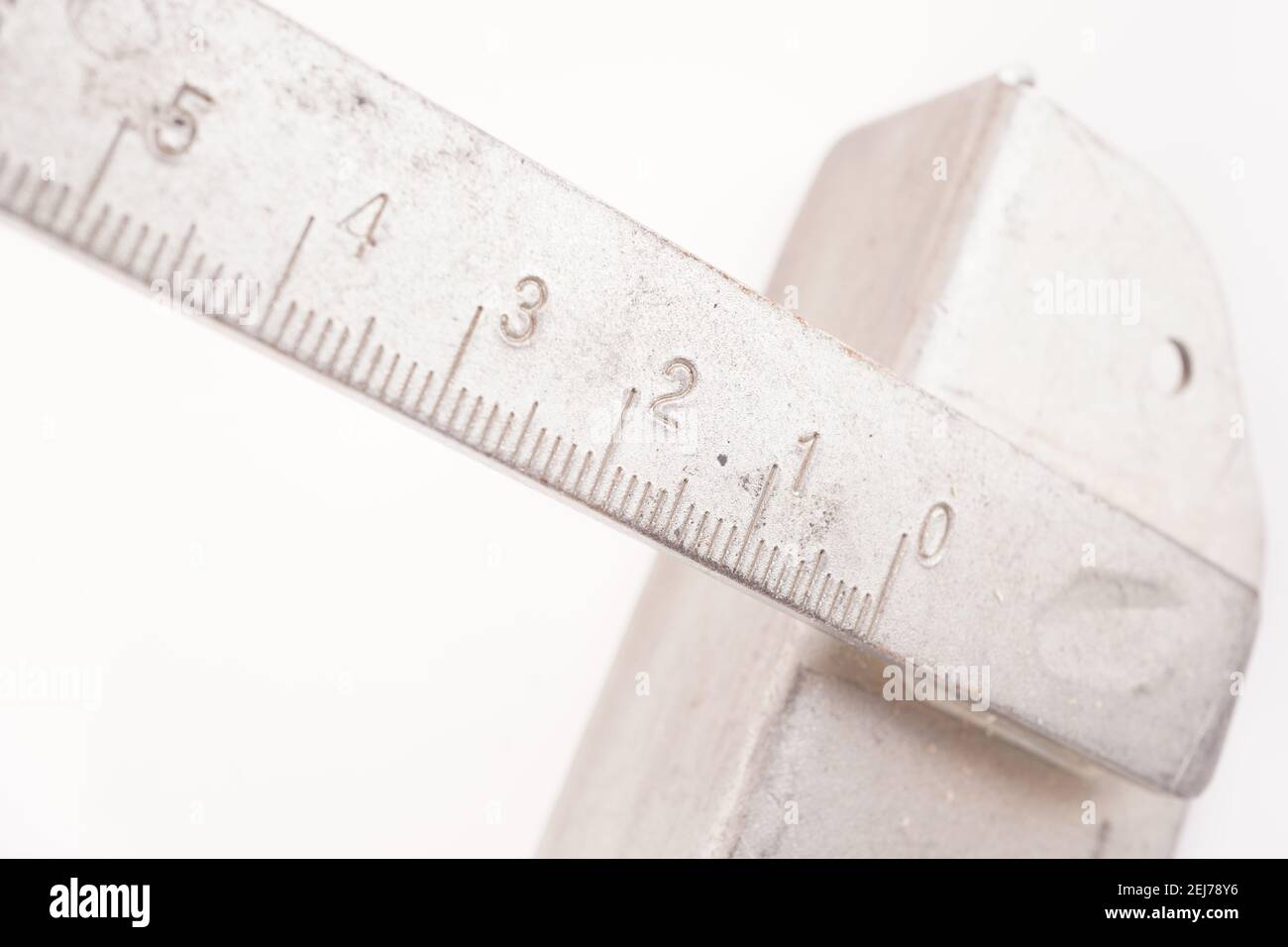 metal ruler on white background Stock Photo - Alamy