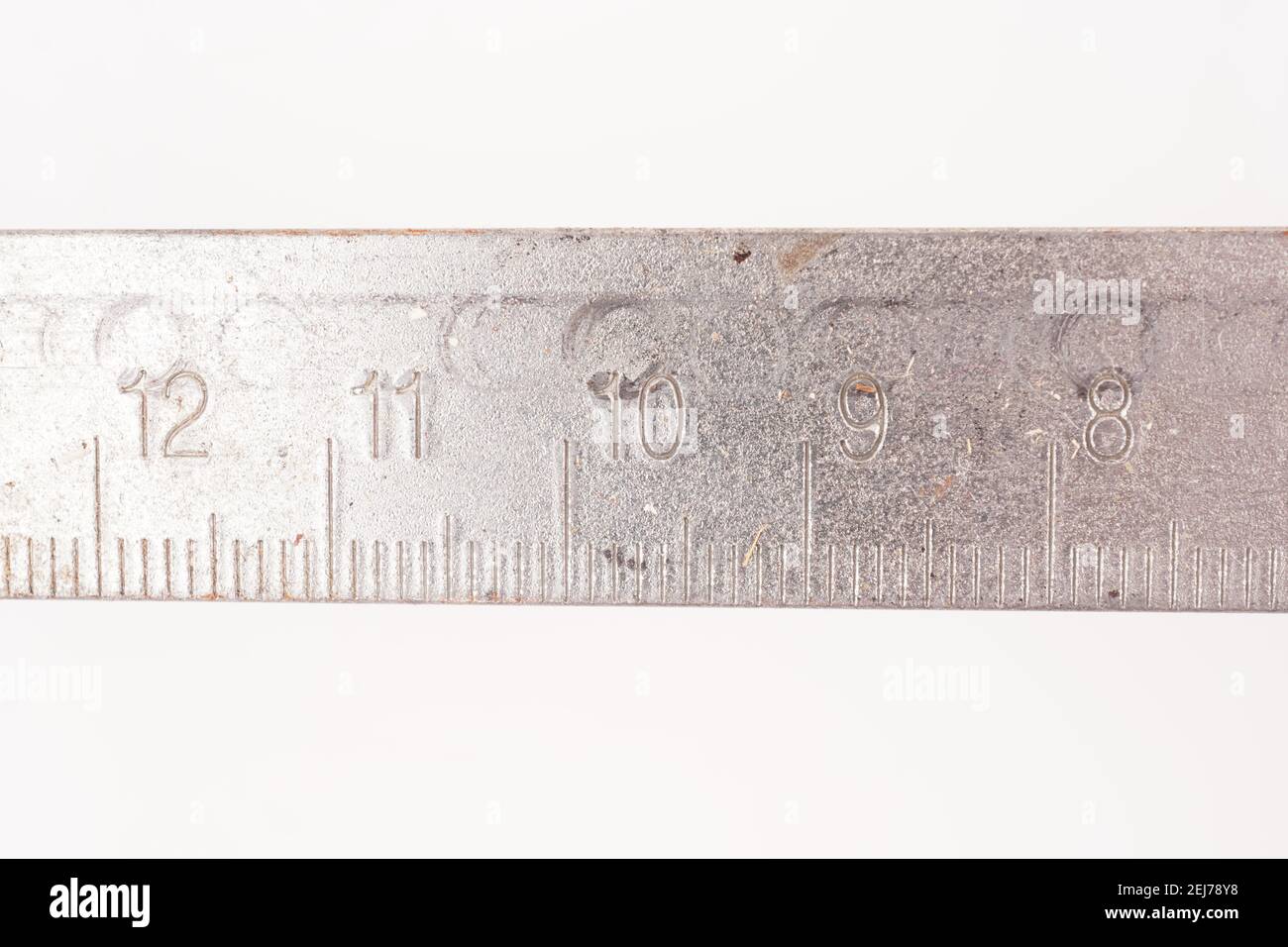 metal ruler on white background Stock Photo - Alamy