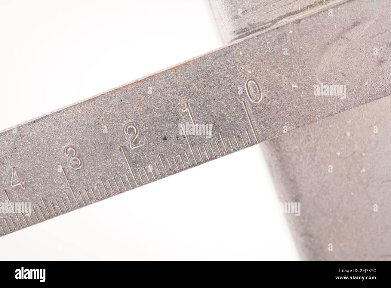 metal ruler on white background Stock Photo - Alamy