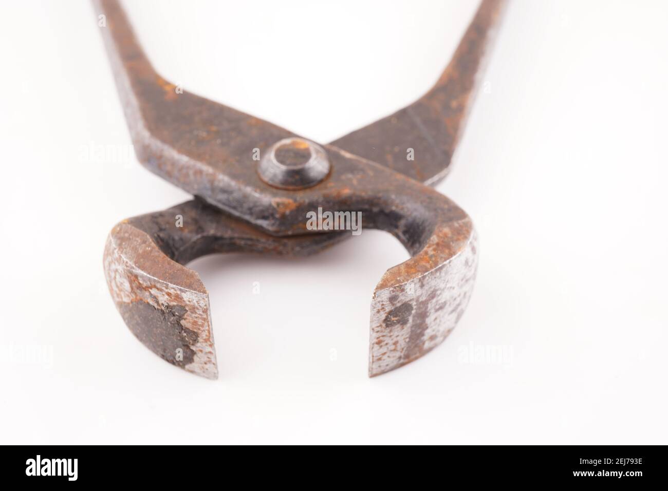 rusty pliers on white background Stock Photo - Alamy