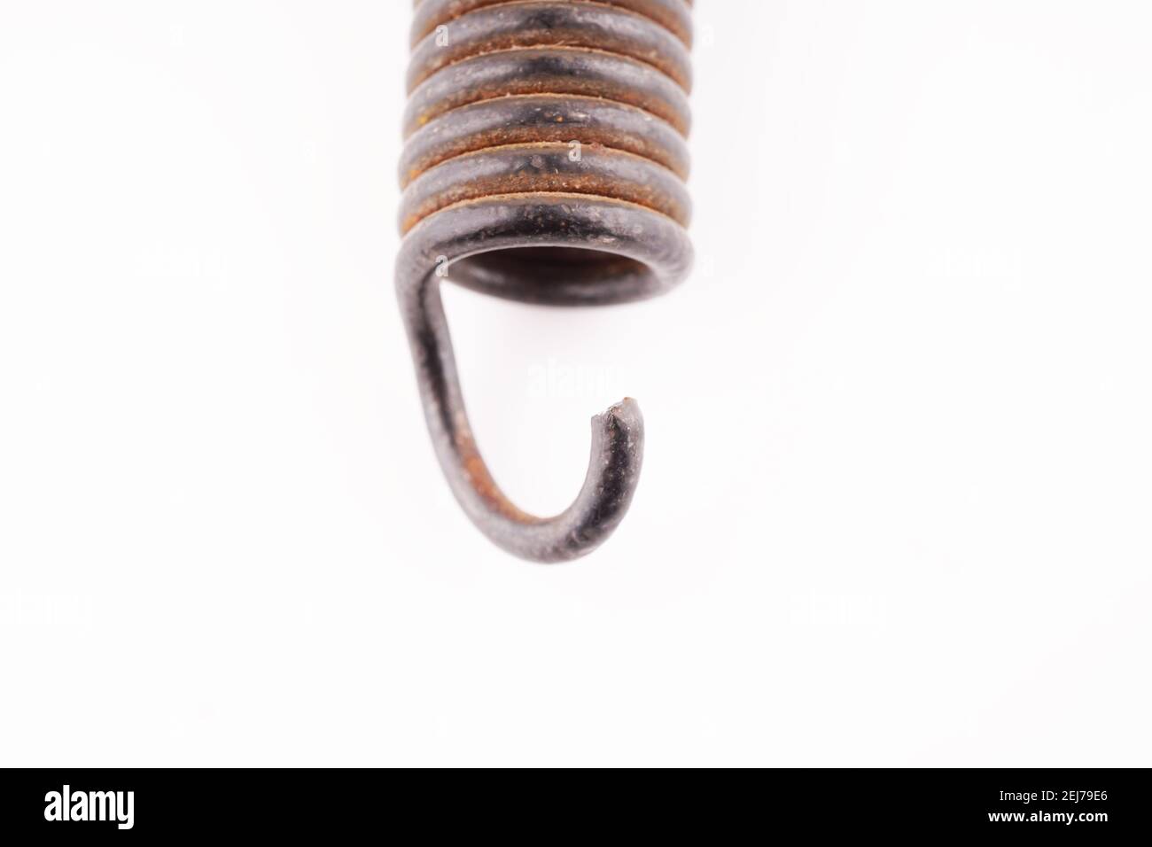 rusty spring on white background Stock Photo - Alamy
