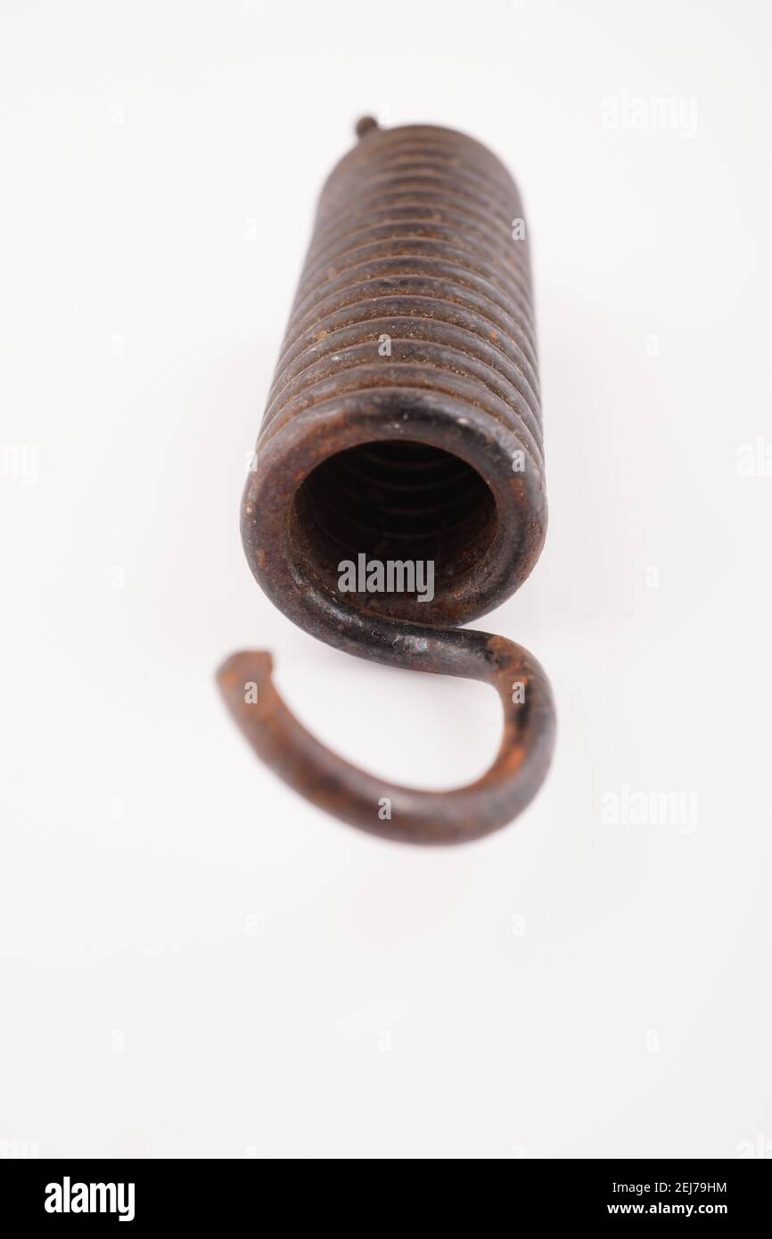 rusty spring on white background Stock Photo - Alamy