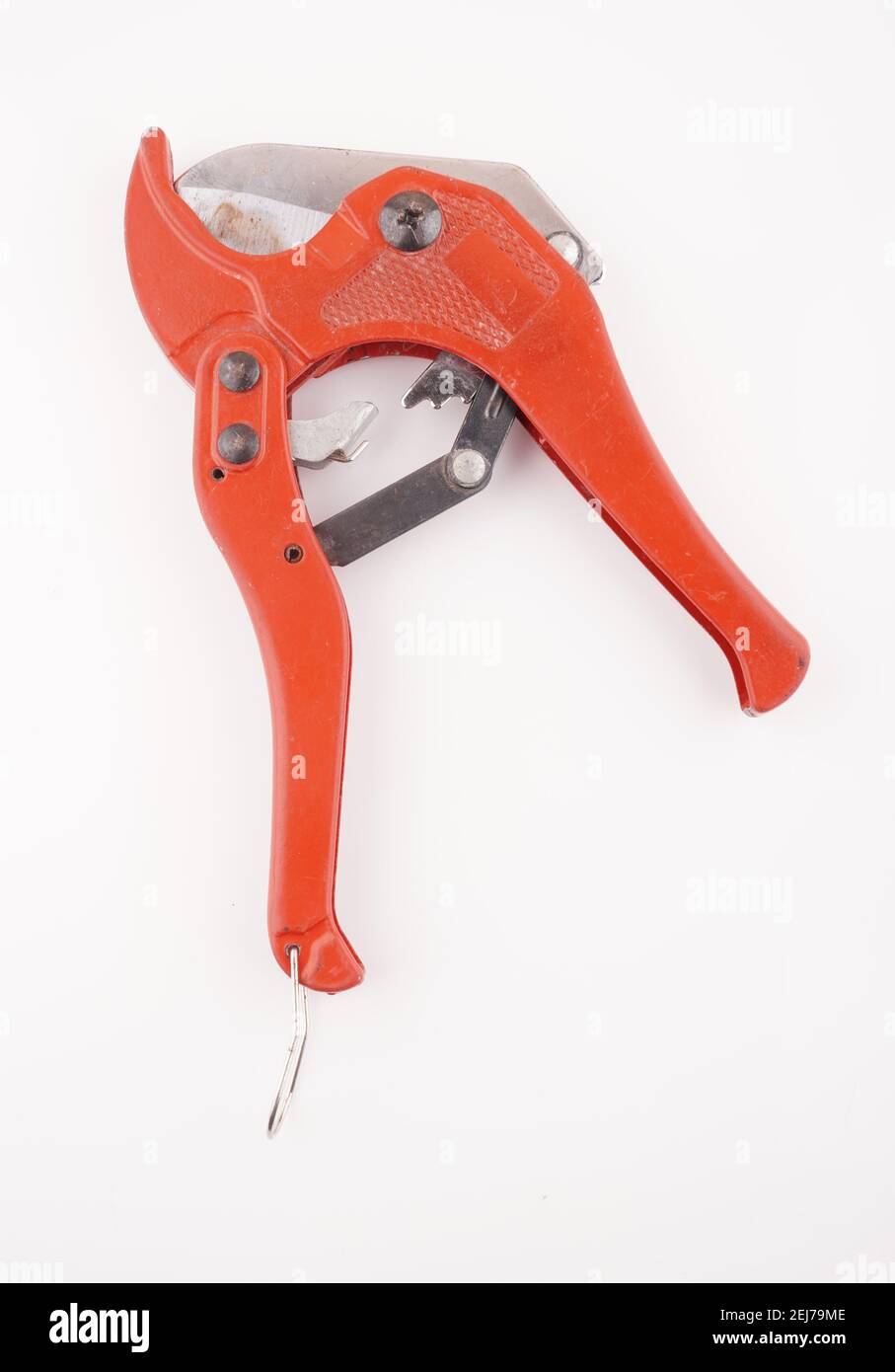 red knife for plastic pipes on a white background Stock Photo - Alamy