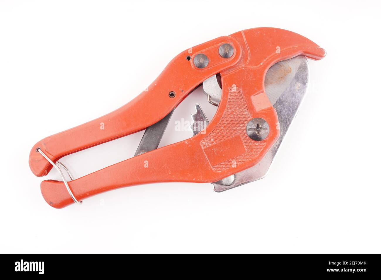 red knife for plastic pipes on a white background Stock Photo - Alamy