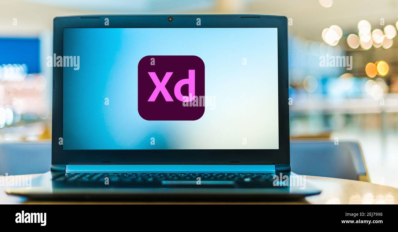 POZNAN, POL - AUG 8, 2020: Laptop computer displaying logo of Adobe XD ...