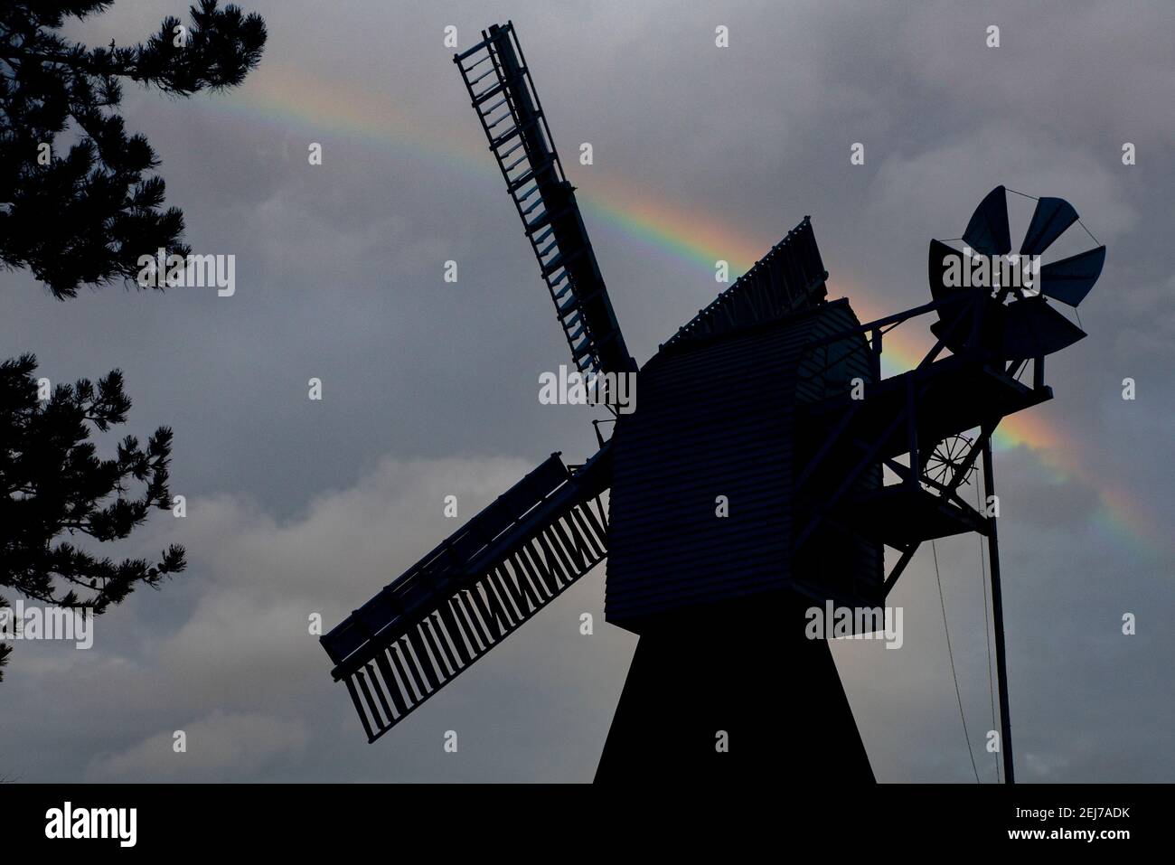 A rainbow behind Wimbledon Common windmill Stock Photo - Alamy