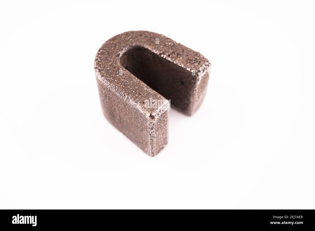 small magnet on white background Stock Photo - Alamy