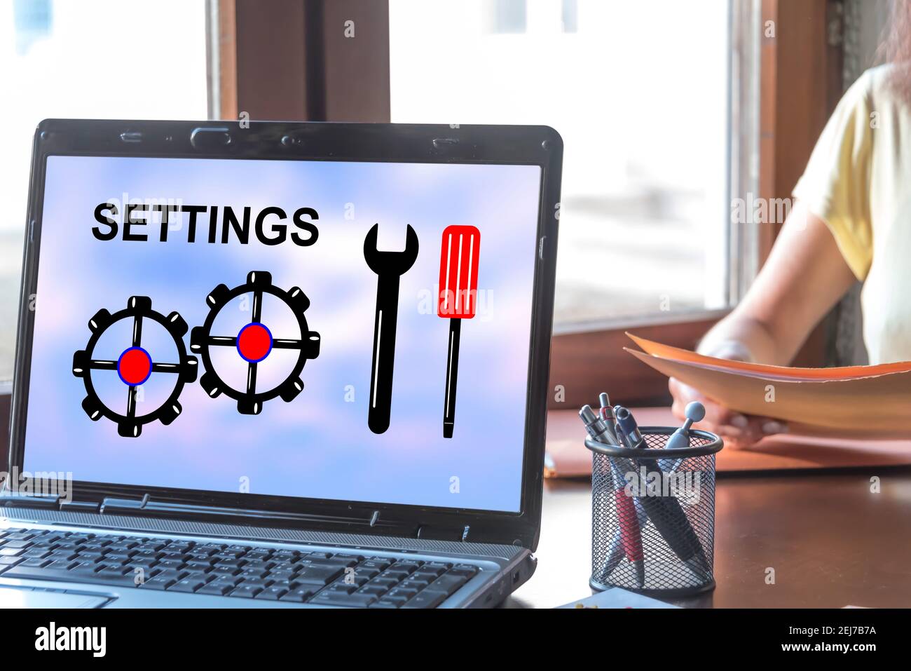 Laptop screen displaying a settings concept Stock Photo - Alamy