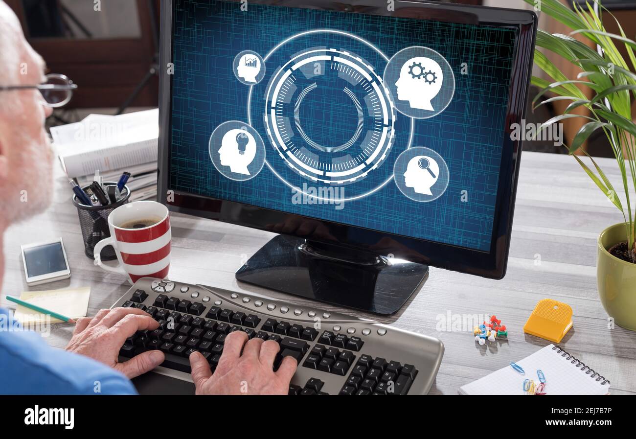 Man using a computer with process improvement concept on the screen ...