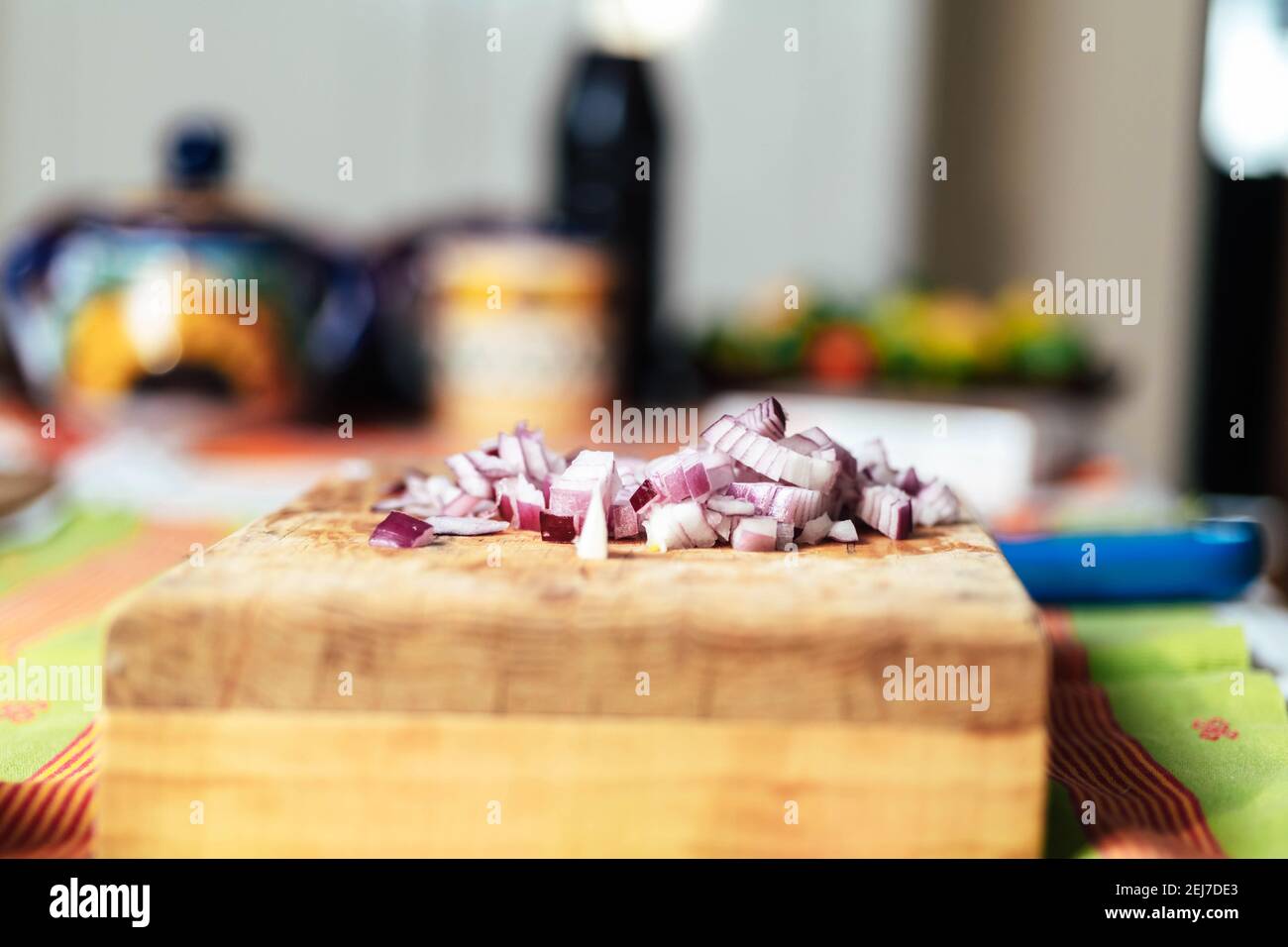 Splitting purple onion for typical Mexican apricot Stock Photo - Alamy