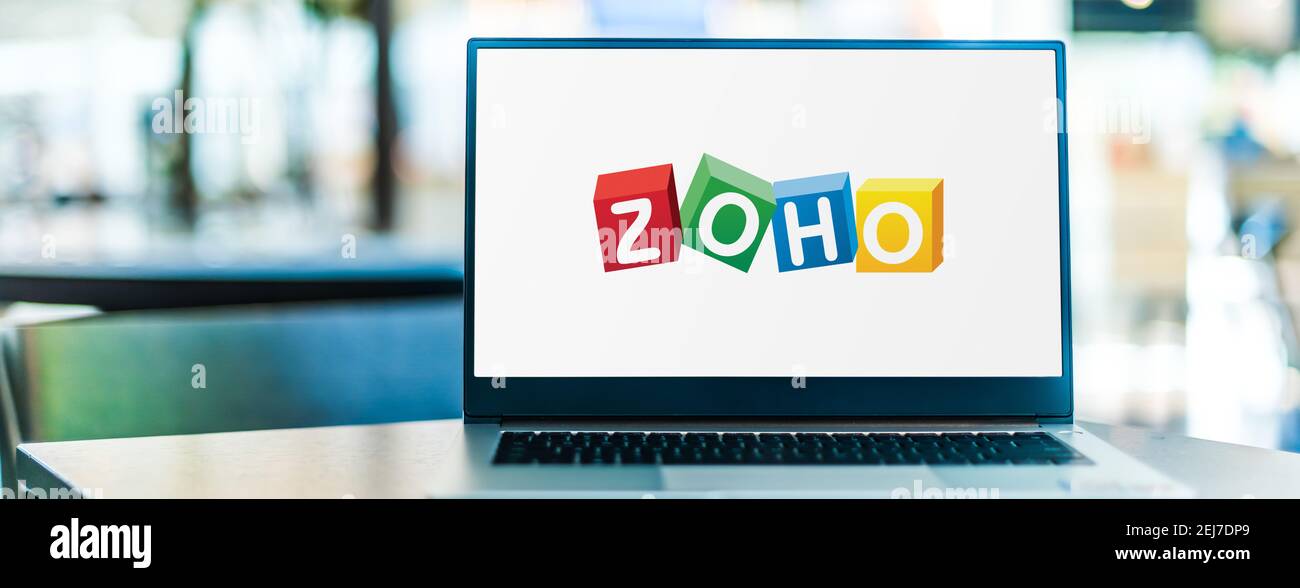POZNAN, POL - SEP 23, 2020: Laptop computer displaying logo of Zoho ...