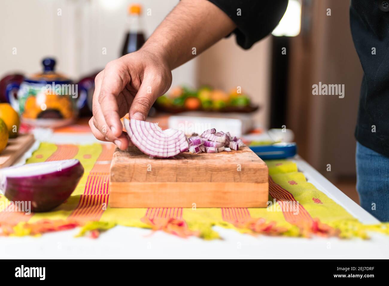Splitting purple onion for typical Mexican apricot Stock Photo - Alamy