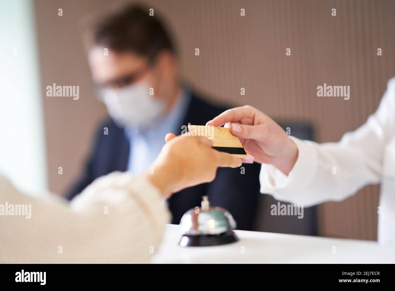 Receptionist working in a hotel Stock Photo - Alamy