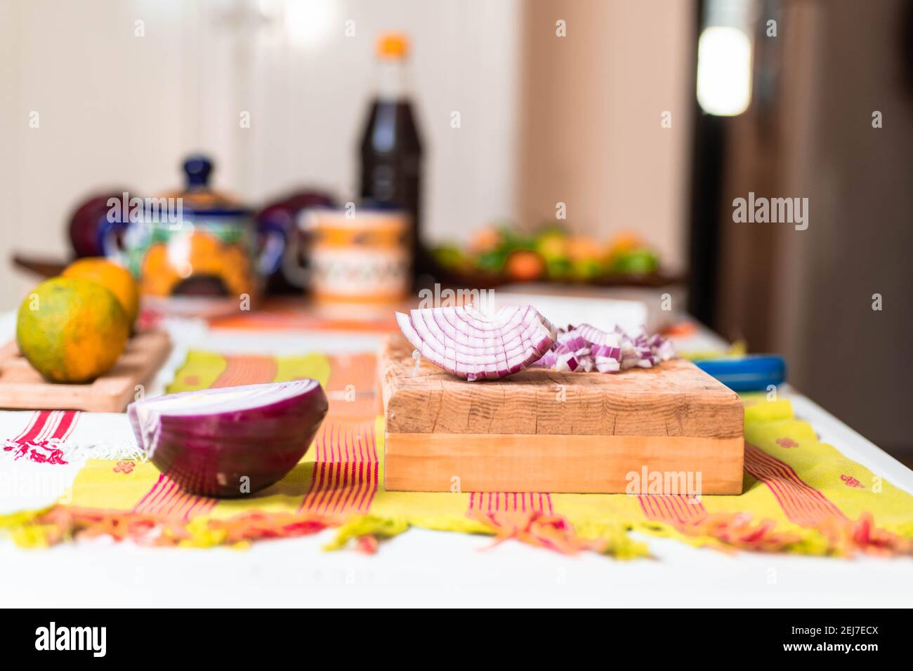 Splitting purple onion for typical Mexican apricot Stock Photo - Alamy