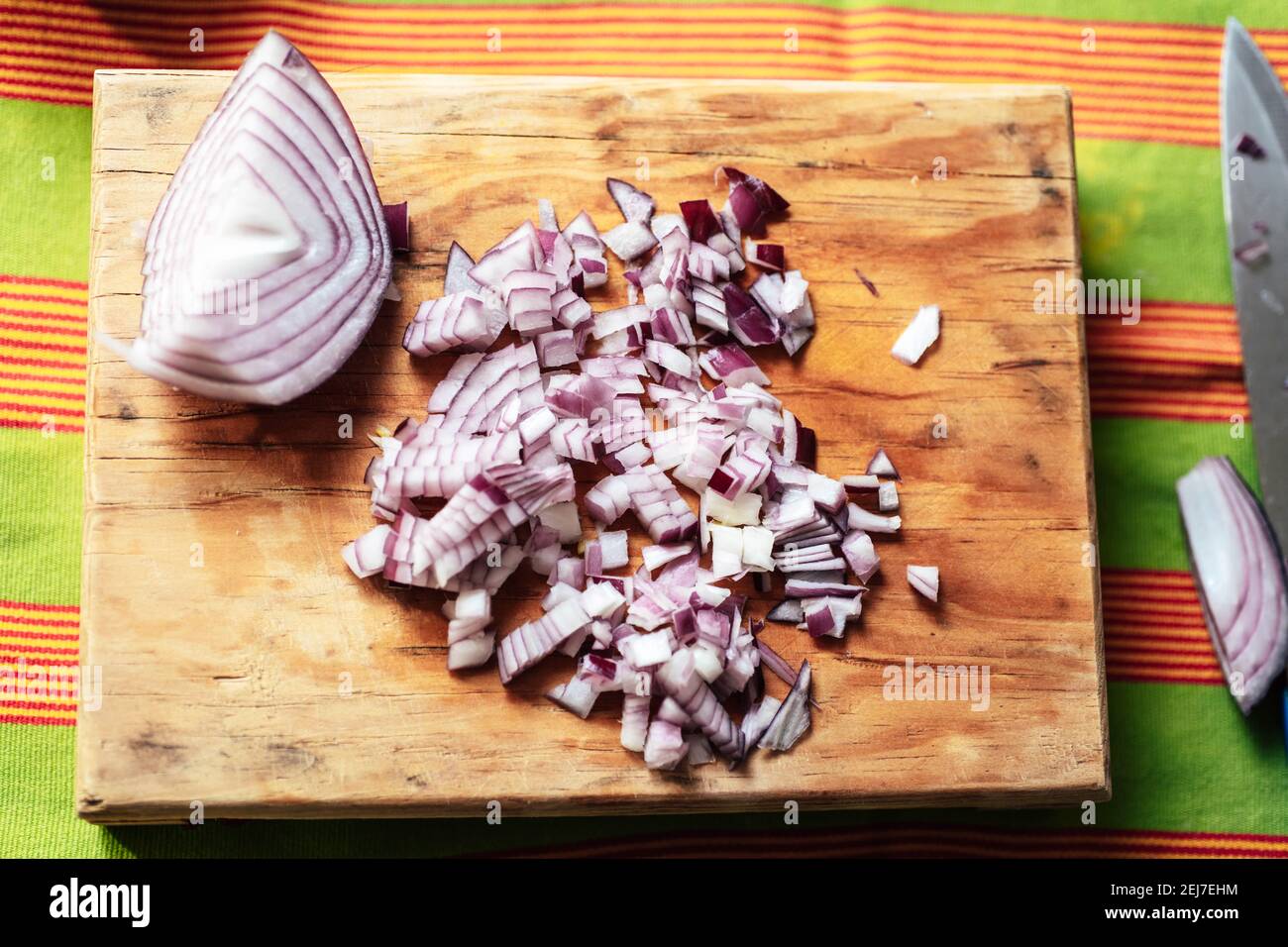 Splitting purple onion for typical Mexican apricot Stock Photo - Alamy
