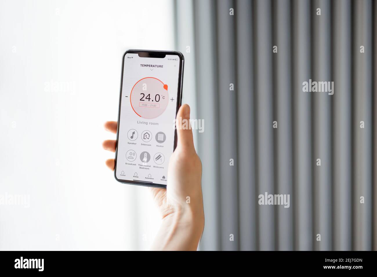 Smartphone with launched application for temperature adjustment Stock ...