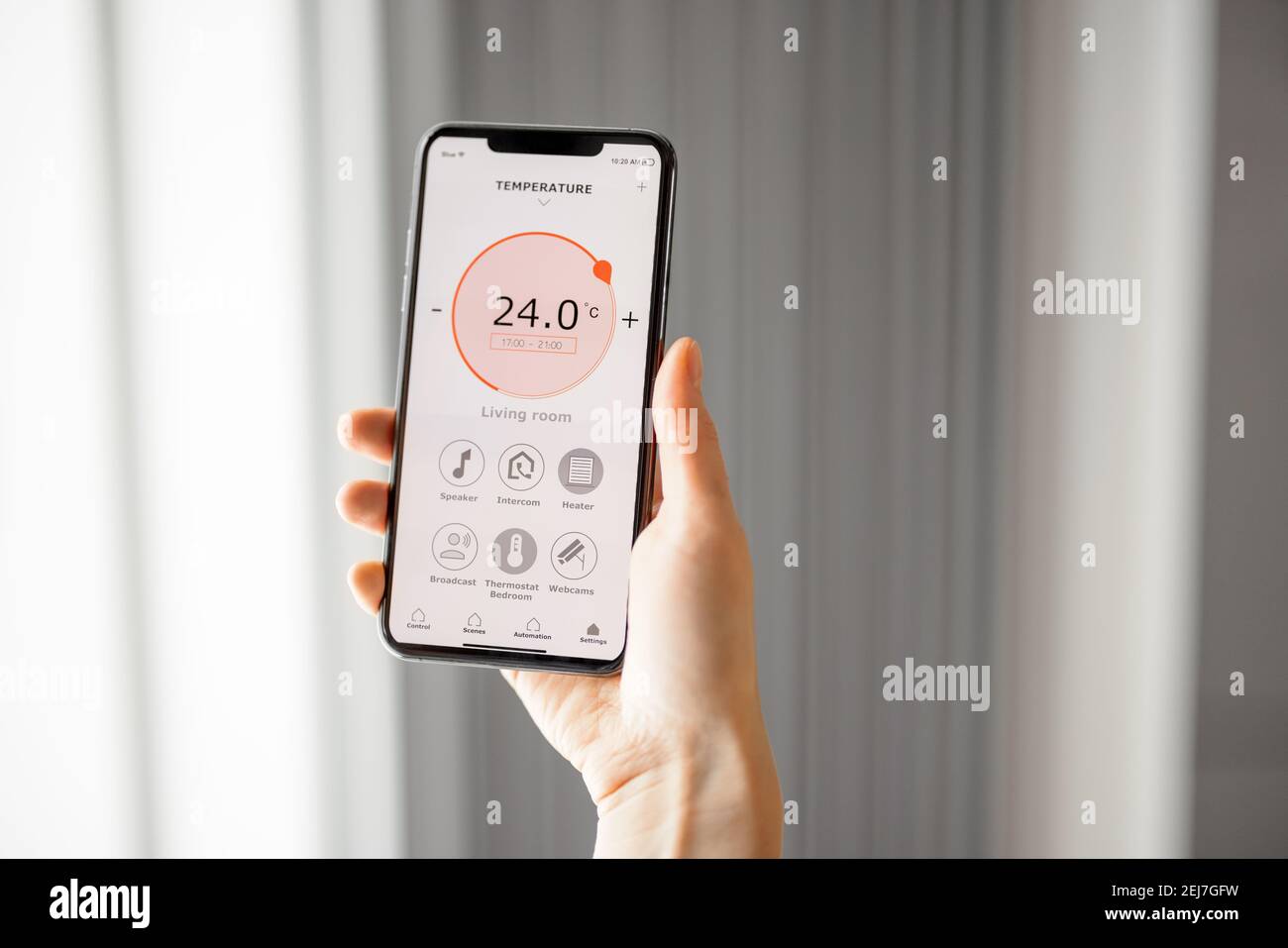 Smartphone with launched application for temperature adjustment Stock ...