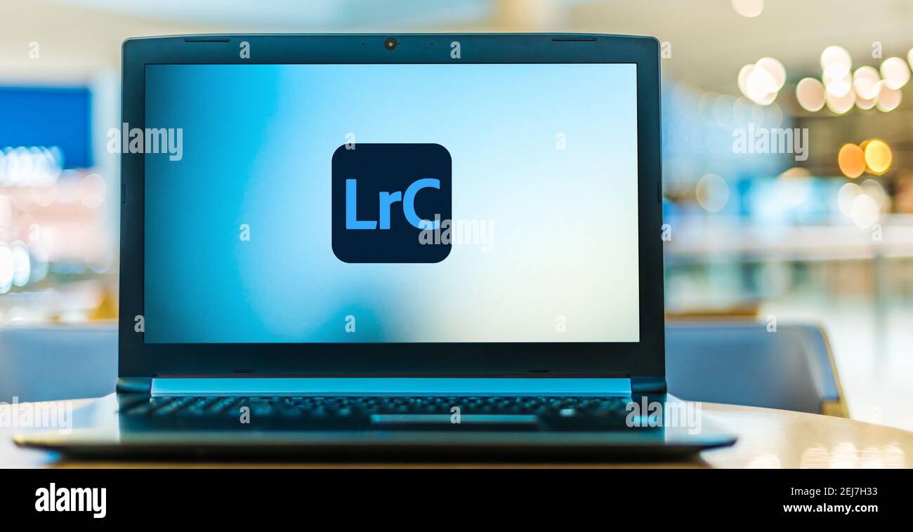 POZNAN, POL - NOV 12, 2020: Laptop computer displaying logo of Adobe ...