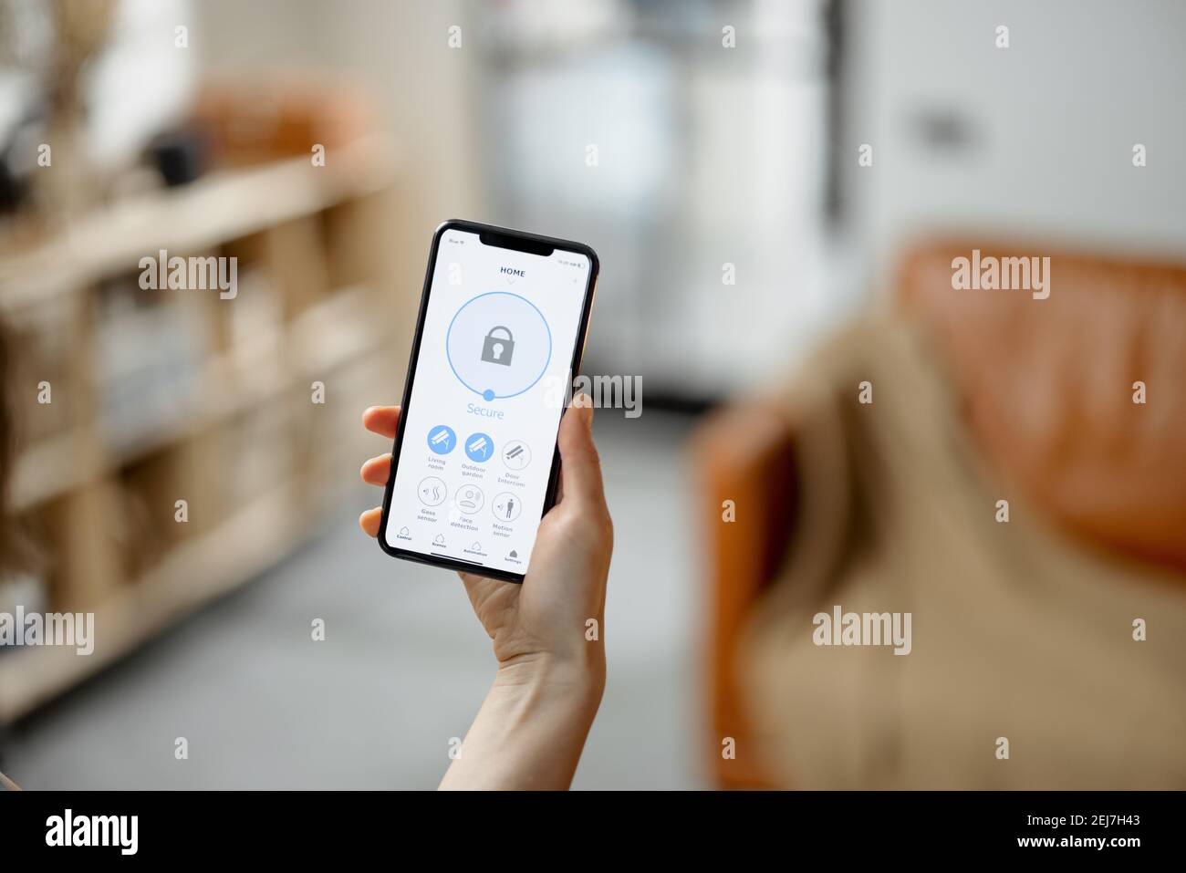 Smartphone with launched application for alarm security Stock Photo - Alamy