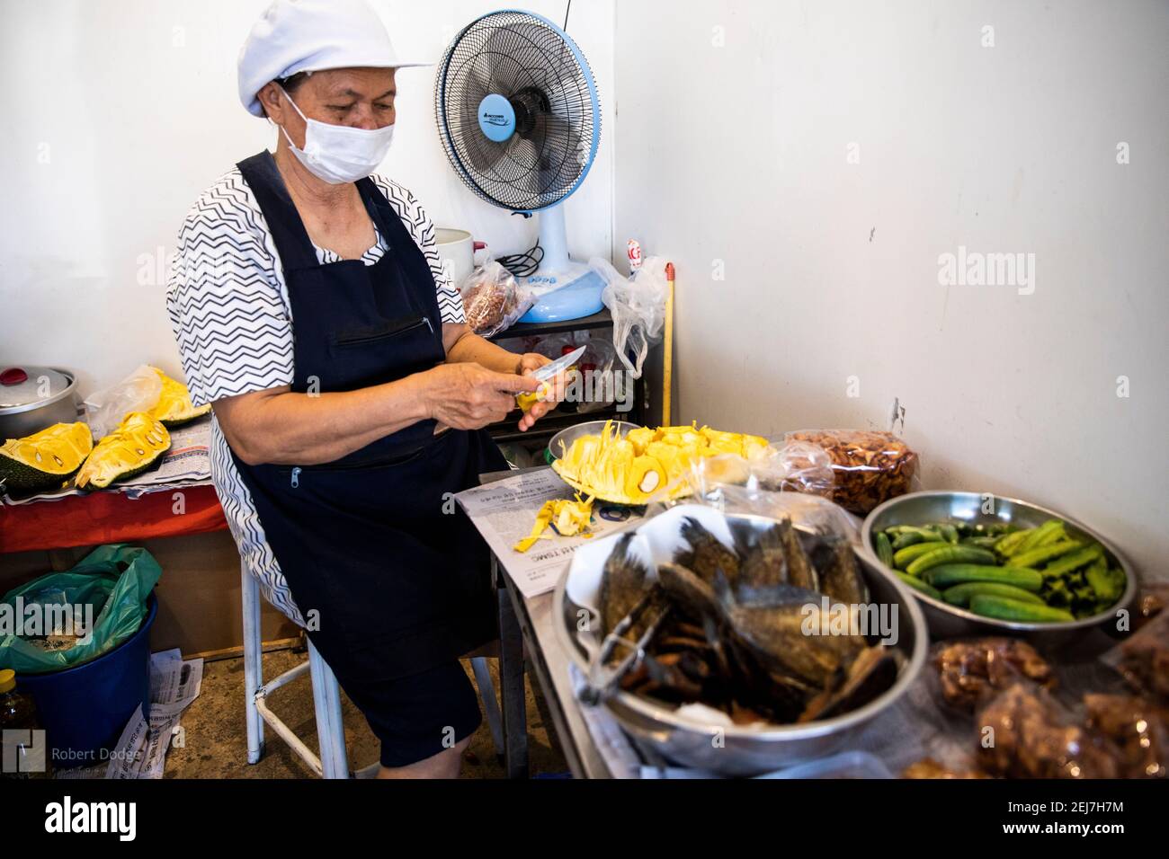 Happy woman dicing food hi-res stock photography and images - Alamy