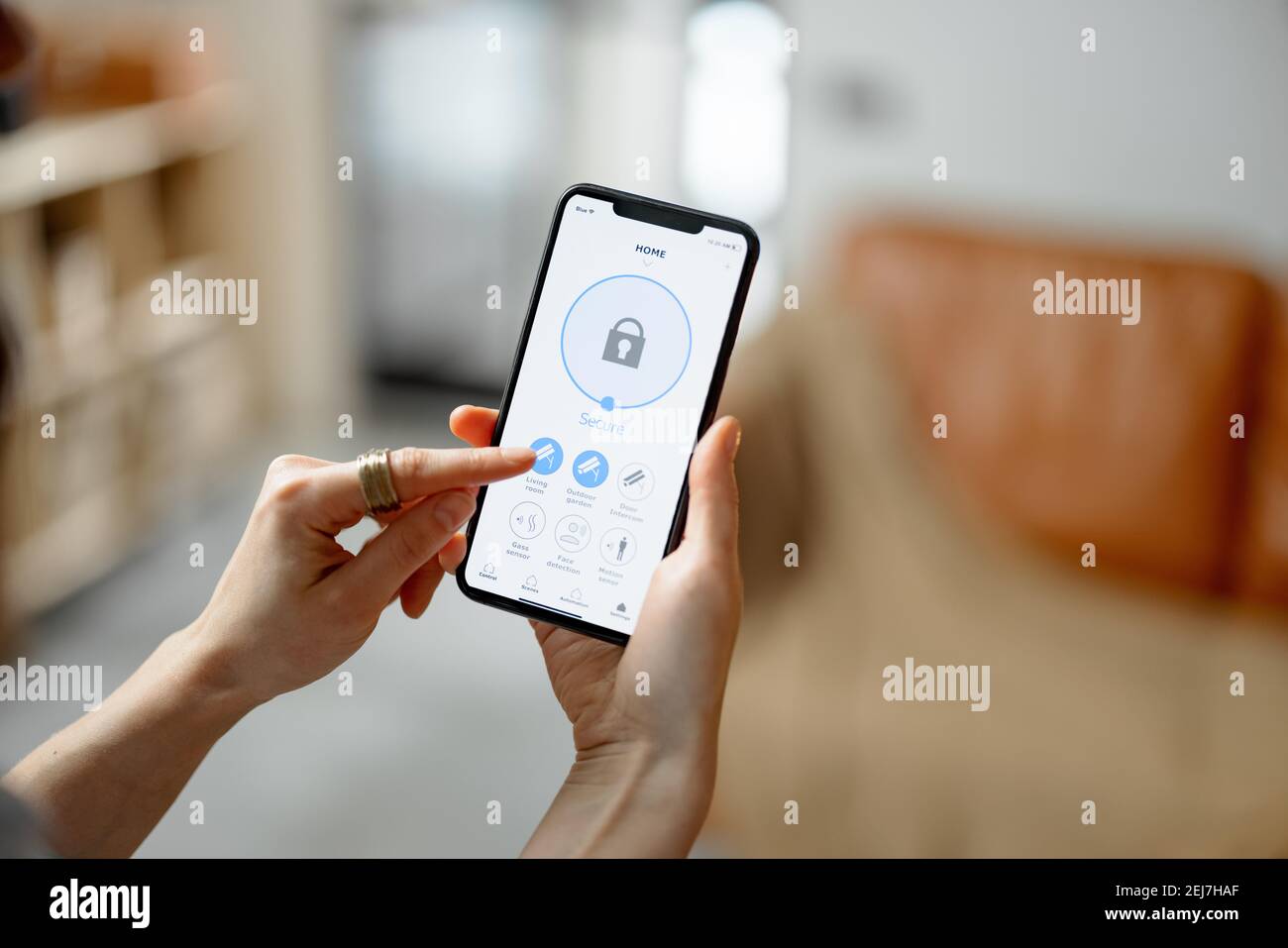 Smartphone with launched application for alarm security Stock Photo - Alamy